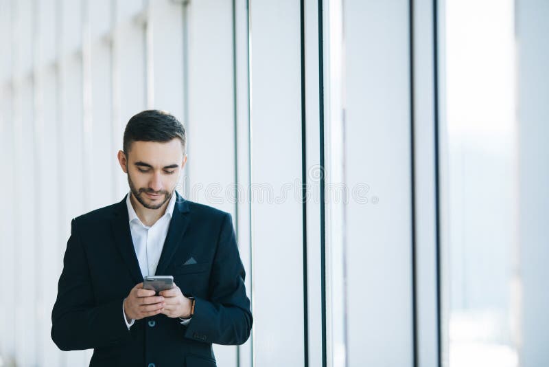 Businessman in Suit Text Sms on Phone in Office Stock Image - Image of ...