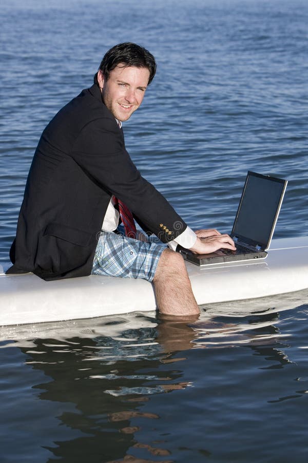 Businessman on Surfboard stock photo. Image of leisure - 9452986