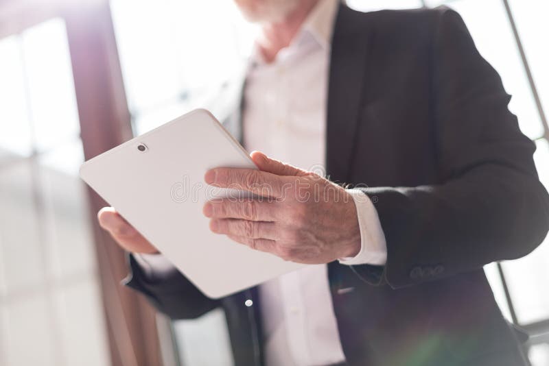 Businessman with Tablet, Light Effect Stock Image - Image of ...