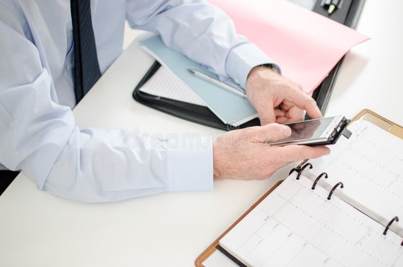 Businessman Taking an Appointment Stock Photo - Image of white, call ...