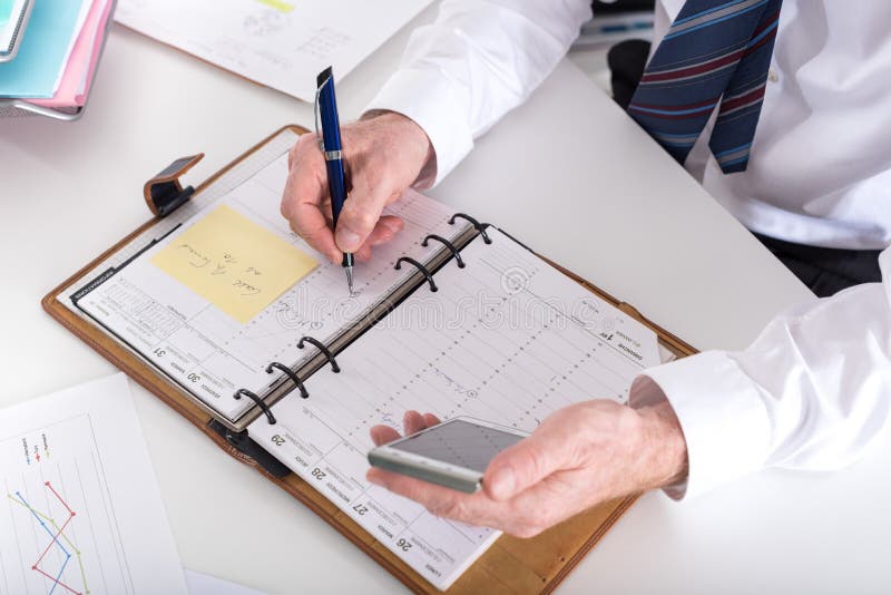 Businessman Taking an Appointment Stock Image - Image of appointment ...