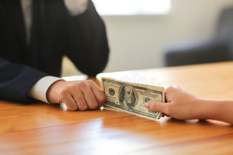 Businessman Taking Bribe from Man Under Table. Corruption Concept Stock ...