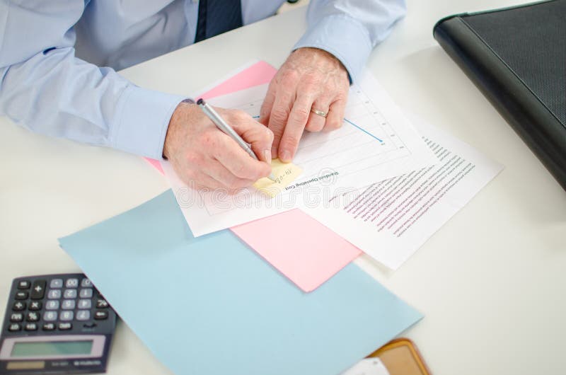 Businessman Taking a Note on a Post it Stock Image - Image of message ...