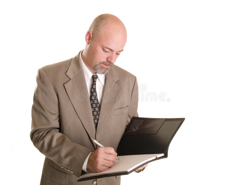 Businessman taking notes stock photo. Image of confidence - 1139530