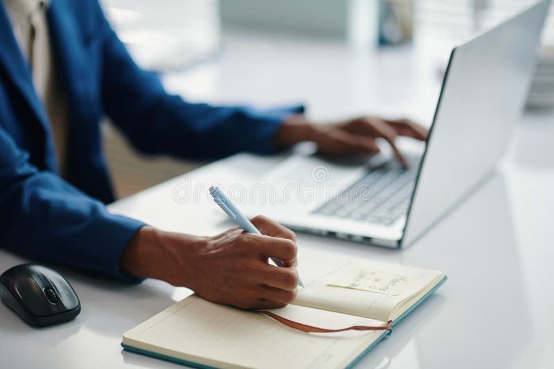 Businessman Taking Notes in Planner Stock Image - Image of employee ...