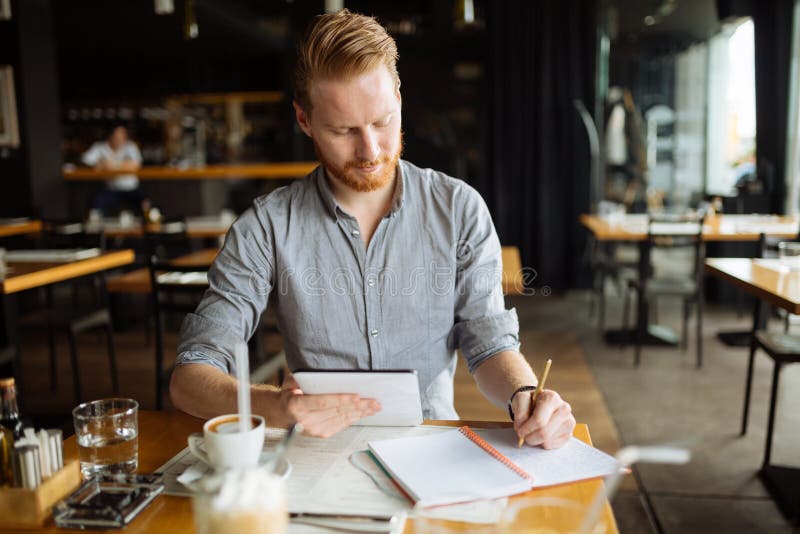 Businessman taking notes stock image. Image of office - 99091121