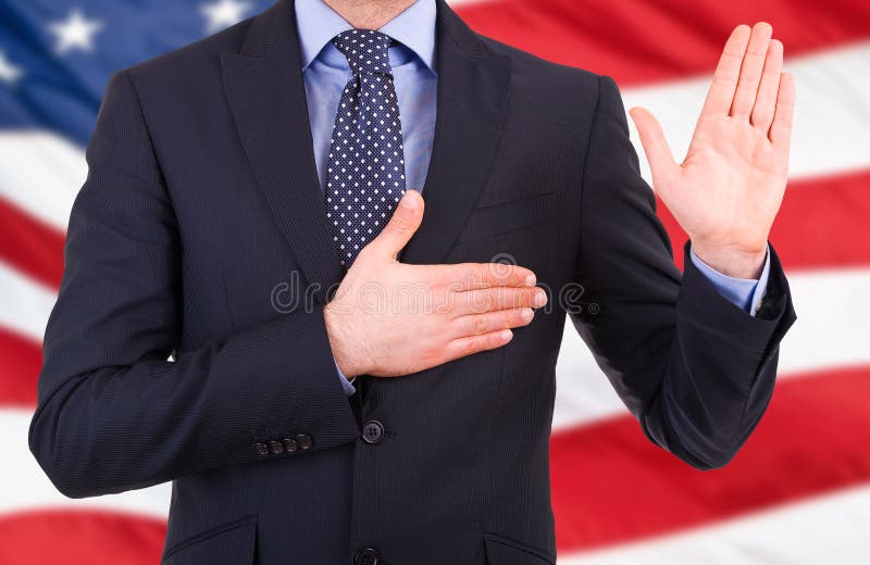 Businessman Taking Oath with Fist Over Heart. Stock Image - Image of ...