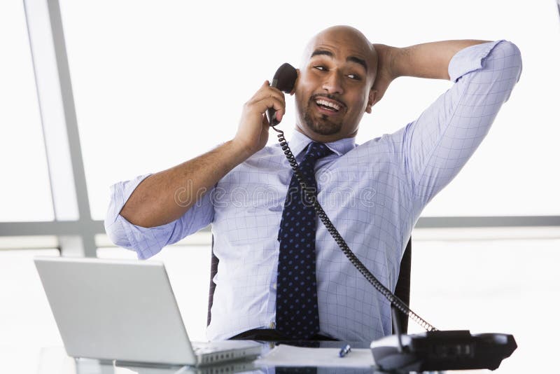 Businessman Taking Phone Call Stock Image - Image of male, eastern: 5293263