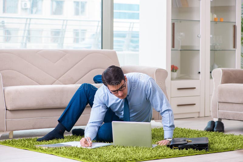 The Businessman Taking Work Home and Working Overtime Stock Image ...