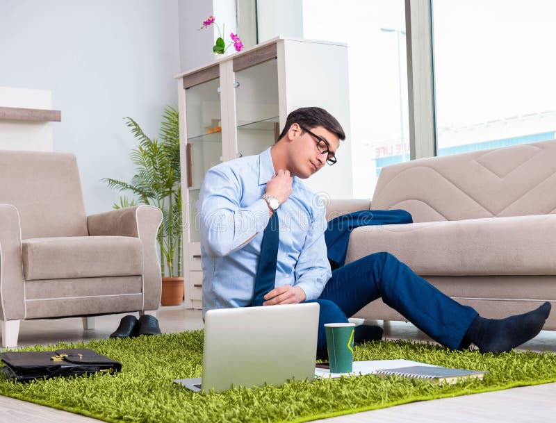 Businessman Taking Work Home and Working Overtime Stock Image - Image ...