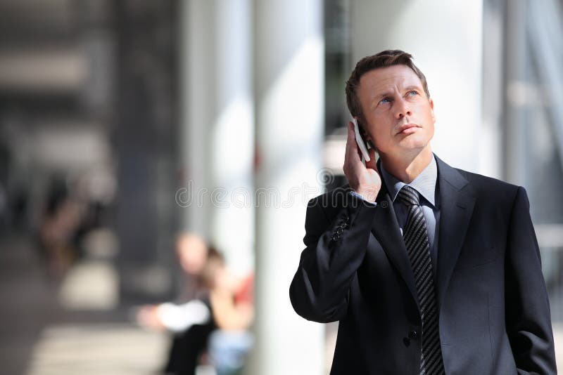 Businessman Talking on the Cell Phone Stock Image - Image of adult ...