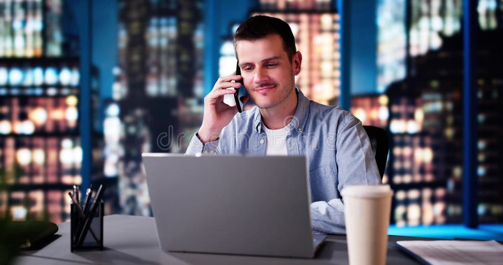 Businessman Talking with Client on Phone. Man Using Computer Stock ...