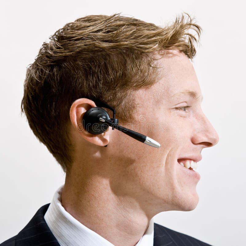 Businessman Talking on Headset Stock Image - Image of european, male ...