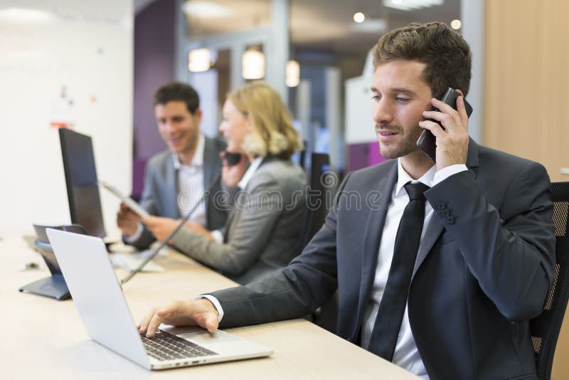 Businessman Talking on the Mobile Phone in Modern Office Stock Image ...