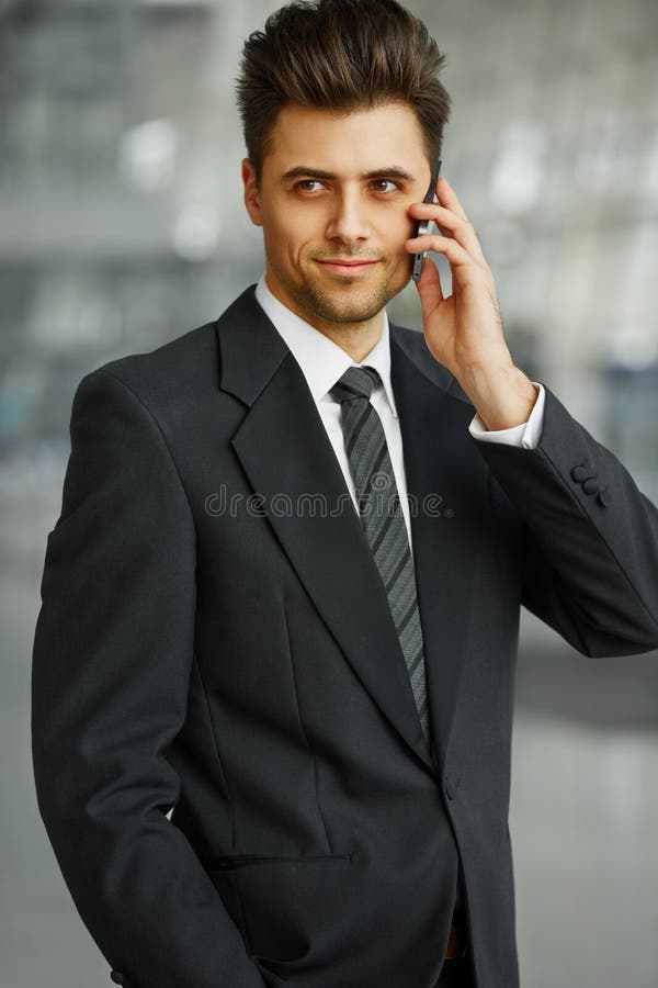 Businessman Talking on the Phone and Smiling Stock Image - Image of ...