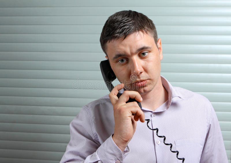 Businessman Talking on Telephone at Office Stock Photo - Image of ...