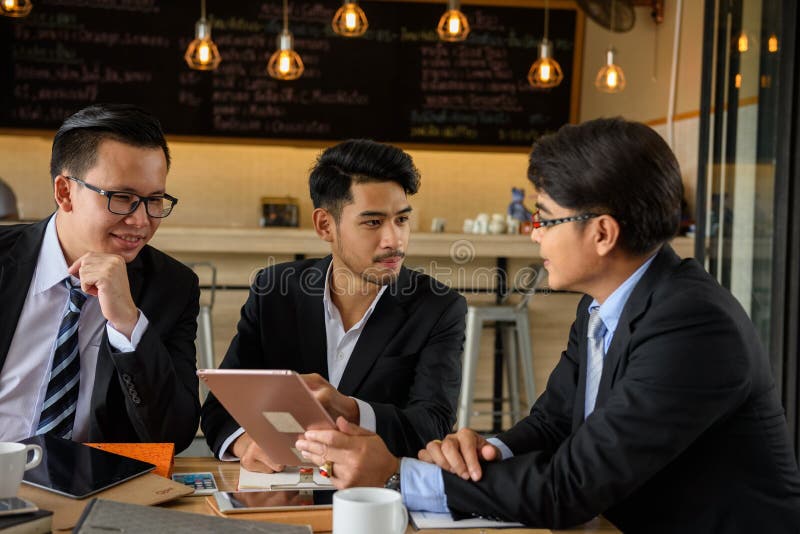Businessman Team Discuss Project at Coffee Cafe Stock Image - Image of ...