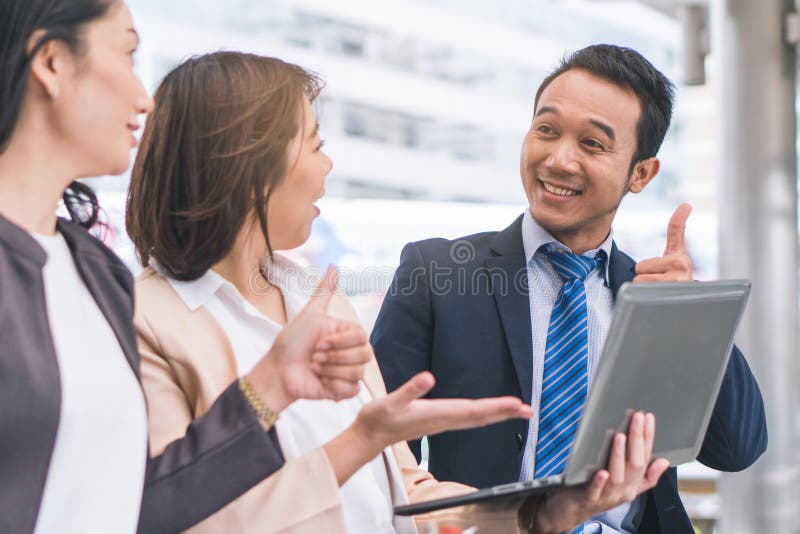 Businessman and Team Meeting Sharing Ideas To Present Project Stock ...