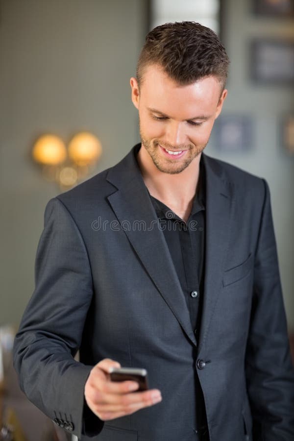 Businessman Text Messaging on Mobilephone Stock Image - Image of mobile ...