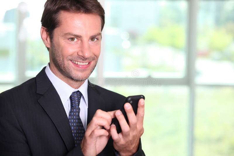 Businessman texting stock image. Image of mobile, modern - 24160095