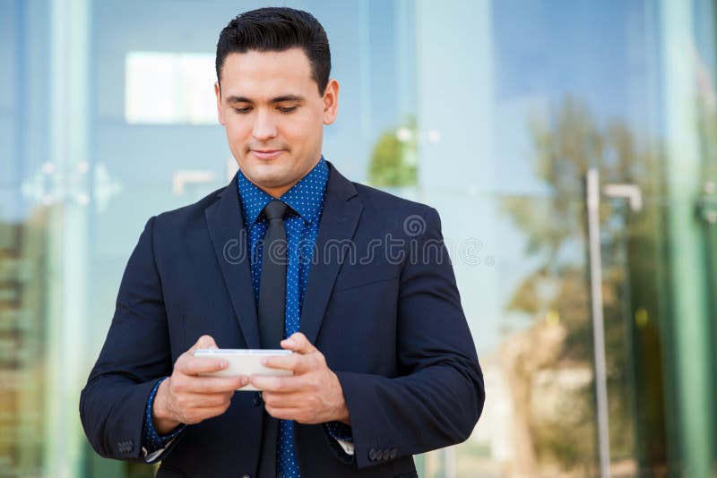 Texting at work hours stock image. Image of mixed, manager - 49730837