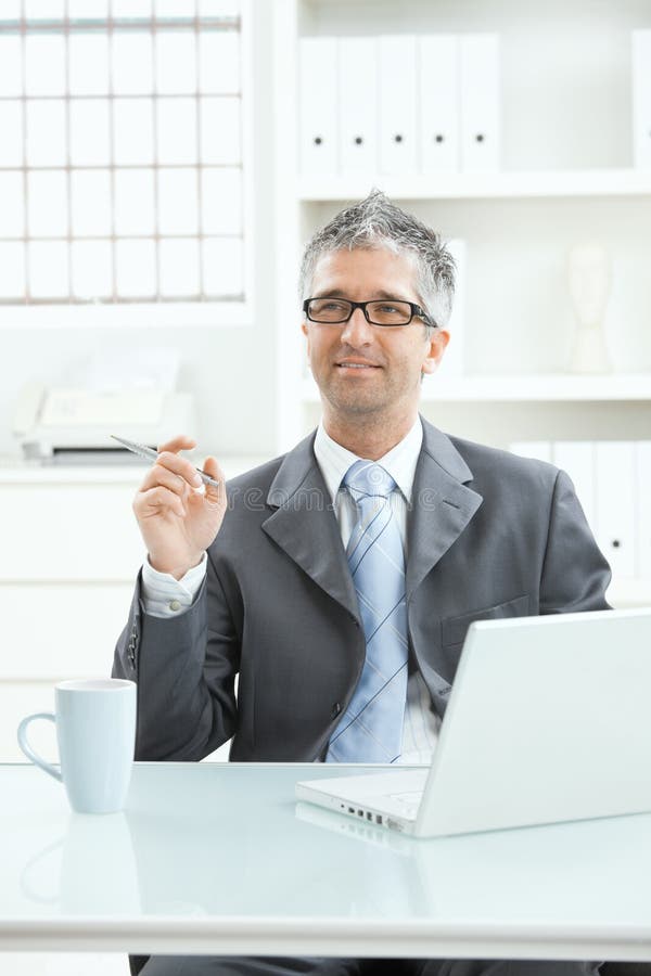 Businessman using laptop stock photo. Image of color, computer - 8366096