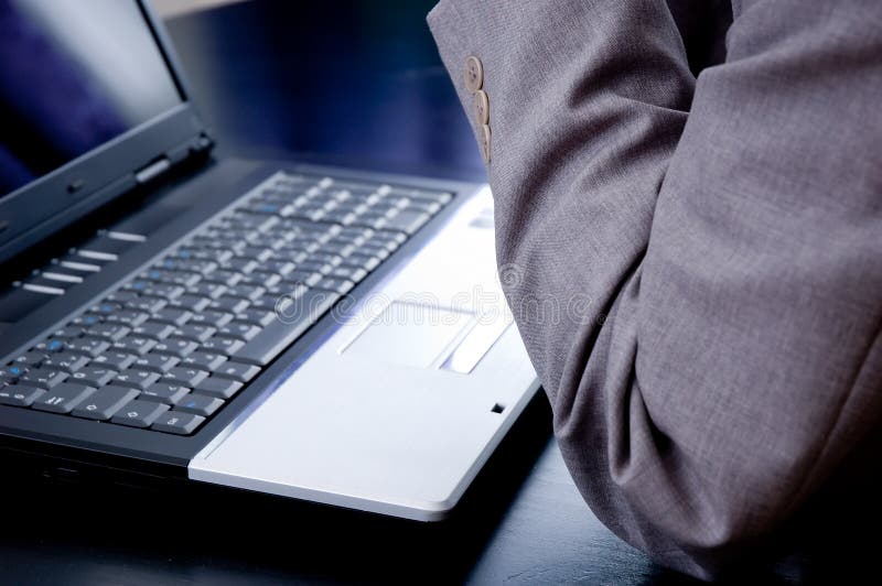 Businessman Thinking in Front of a Laptop Stock Image - Image of finger ...