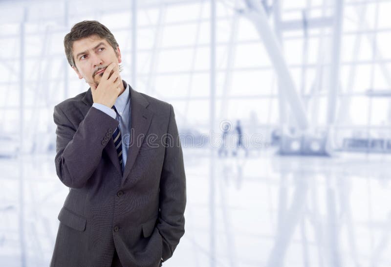 Businessman Thinking at the Office Stock Image - Image of face ...