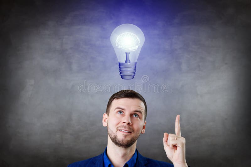 Businessman Thinking and Pointing Finger on Light Bulb Over Head. Stock ...