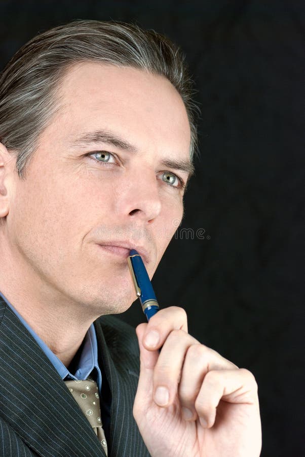 Businessman Tapping The Side Of His Nose Stock Photo - Image of gesture ...