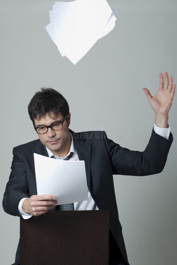 Businessman Throwing Documents Away! Stock Photo - Image of frustration ...