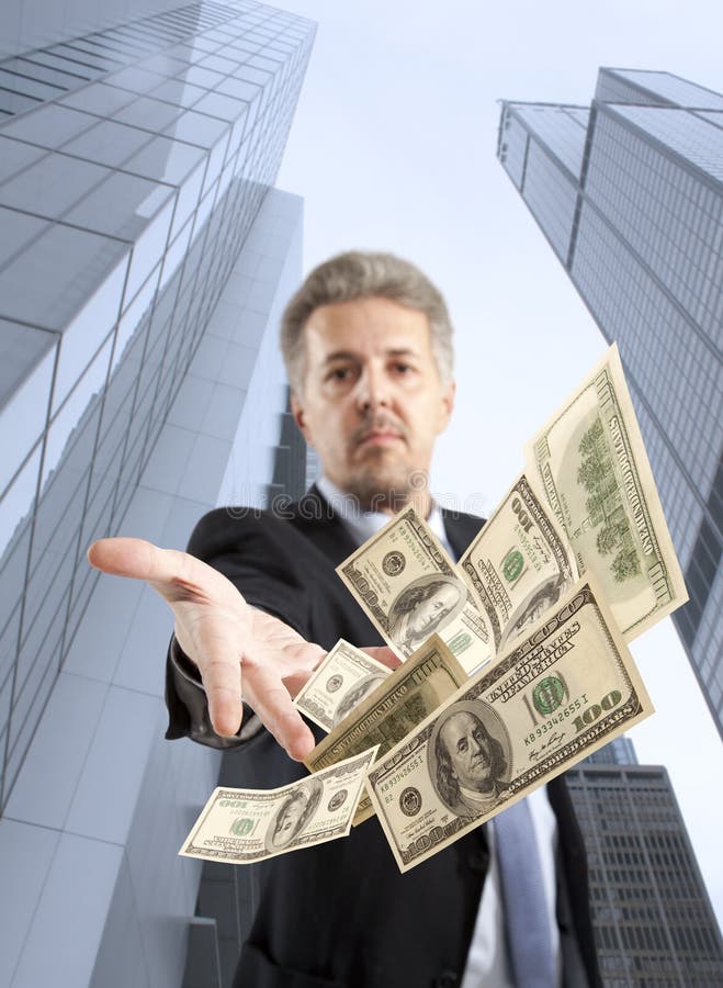 Throwing up dollar bills stock photo. Image of financial - 13741490