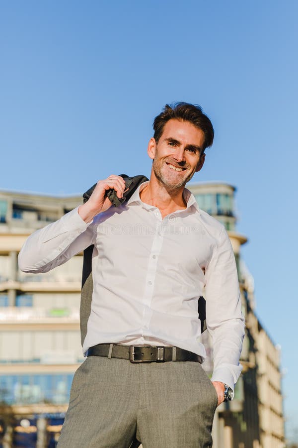 Businessman Throws His Jacket Over the Shoulder Stock Image - Image of ...
