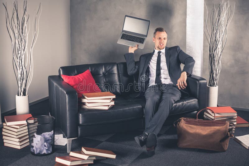 Businessman throws laptop stock image. Image of corporate - 44965827