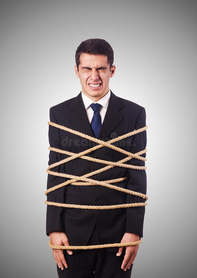 Businessman Tied Up with Rope Against Gradient Stock Photo - Image of ...