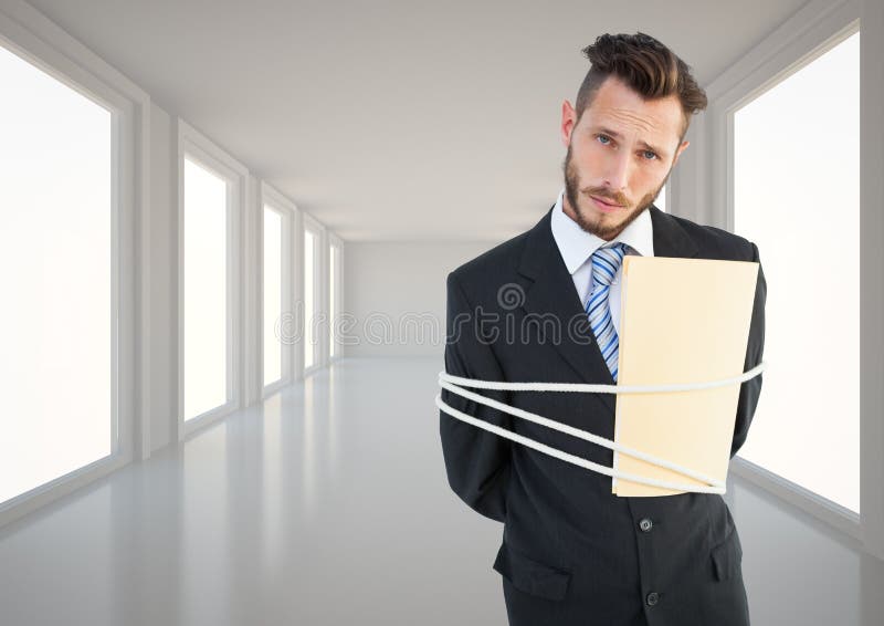 Businessman Tied Up in Rope in Corridor Stock Photo - Image of portrait ...