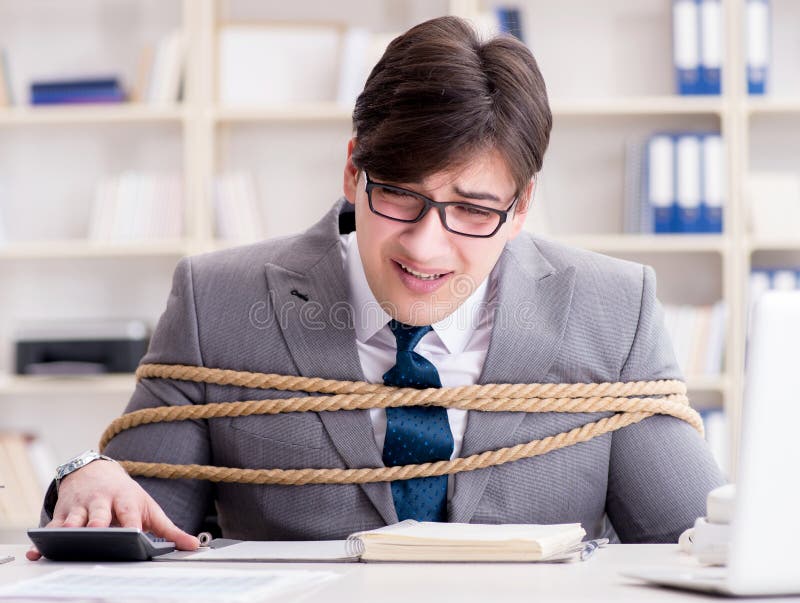 Businessman Tied Up with Rope in Office Stock Photo - Image of prisoner ...
