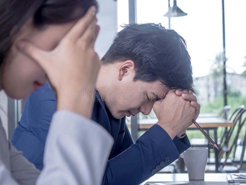 Tired Businessman at Desk with Laptop Searching Way Out from Difficult ...