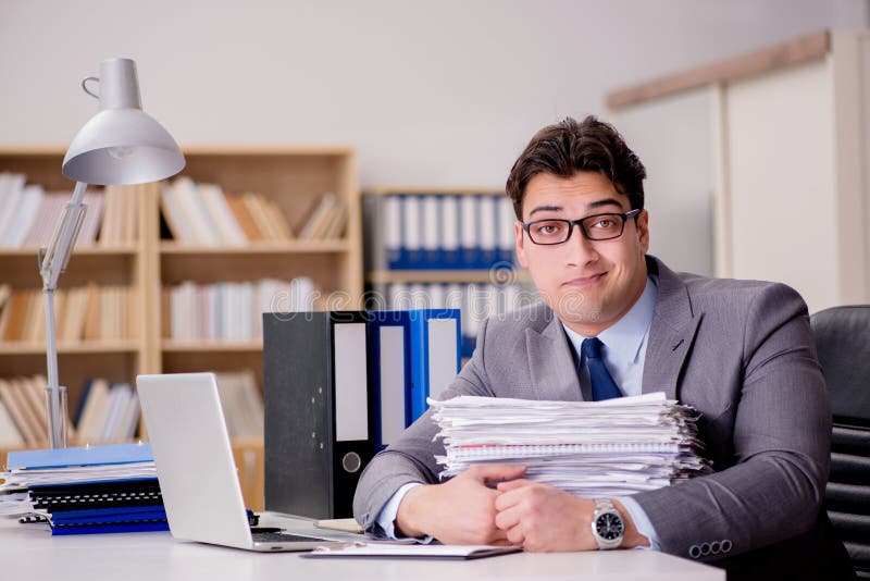 The Businessman with Too Much Paperwork Stock Photo - Image of computer ...
