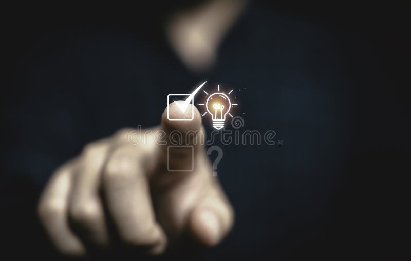 Businessman Touching To Tick Correct Sign Mark on Glowing Lightbulb for ...