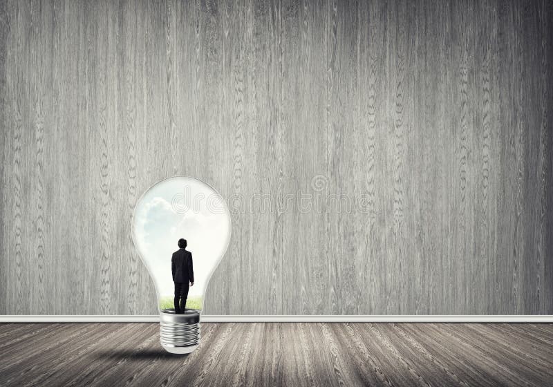Businessman Trapped in Bulb Stock Image - Image of motivation, light ...