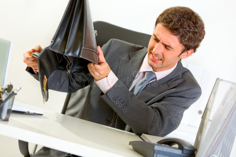 Businessman Trying Shakes Out Everything from Case Stock Image - Image ...