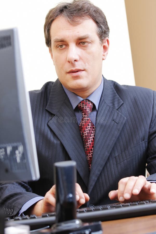 Businessman typing stock image. Image of monitor, looking - 11934233