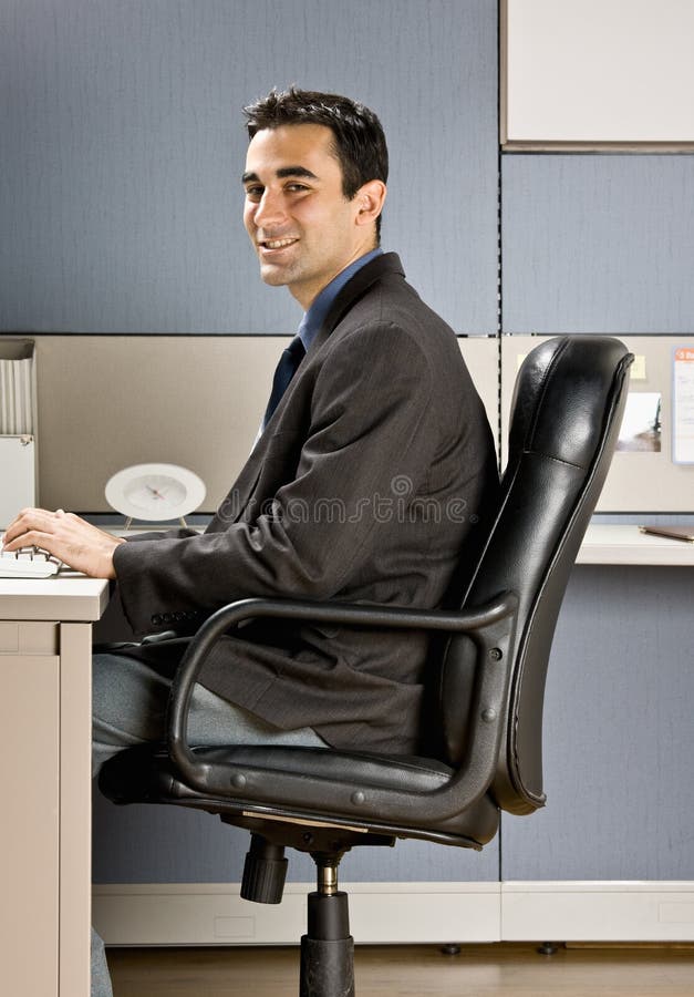 Businessman Typing on Computer at Desk Stock Photo - Image of confident ...
