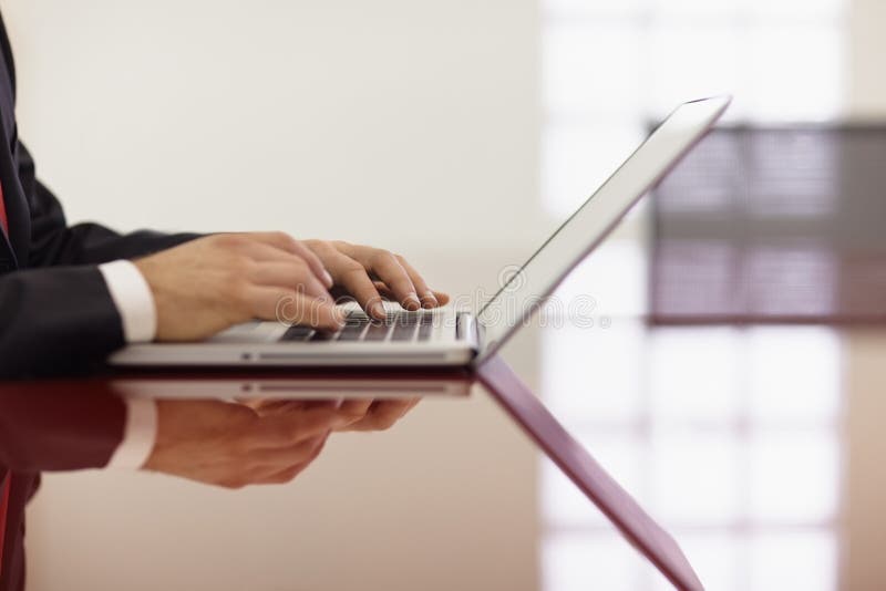 Man typing on laptop stock image. Image of businessperson - 3285139