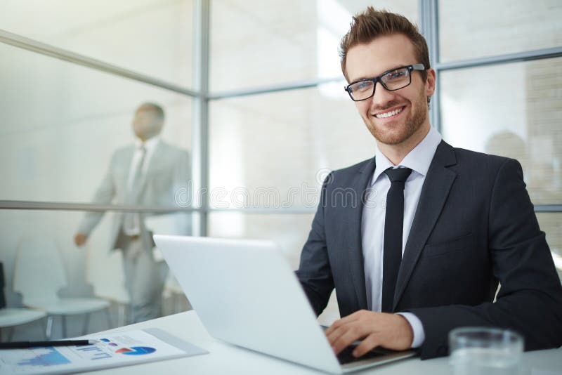 Businessman Typing on Laptop Stock Image - Image of typing, eyeglasses ...