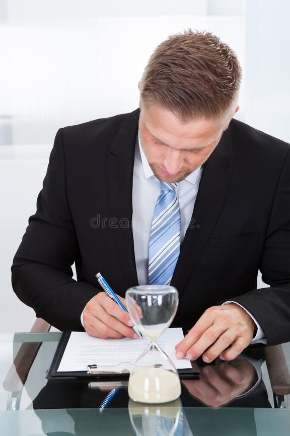 Businessman Under Time Pressure Stock Image - Image of document ...