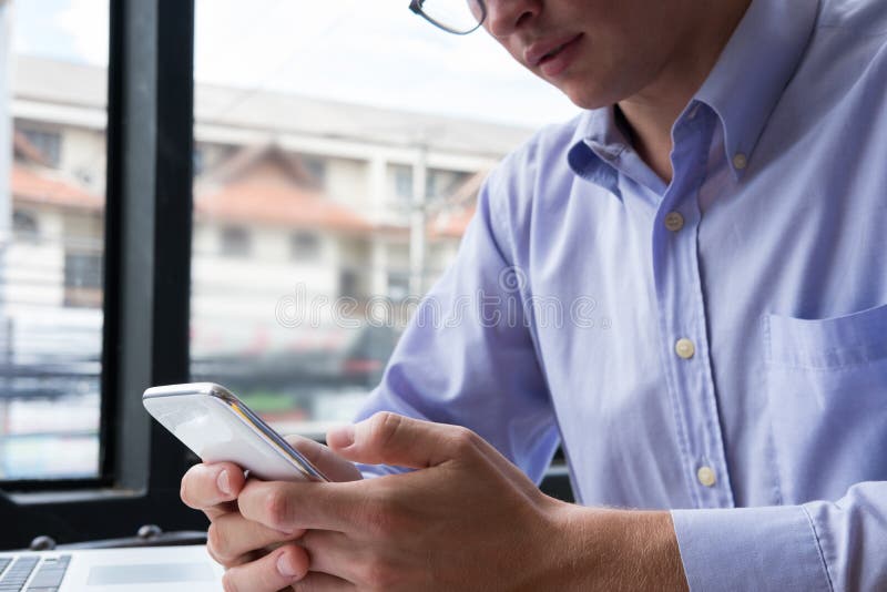 Businessman Use Mobile Phone at Workplace. Man Texting Message O Stock ... Businessman Use Mobile Phone at Workplace. Man Texting Message O Stock ...