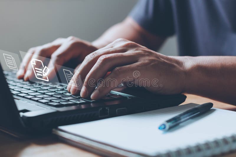 Businessman Uses Computer Laptop for Online Editing Document with the ...