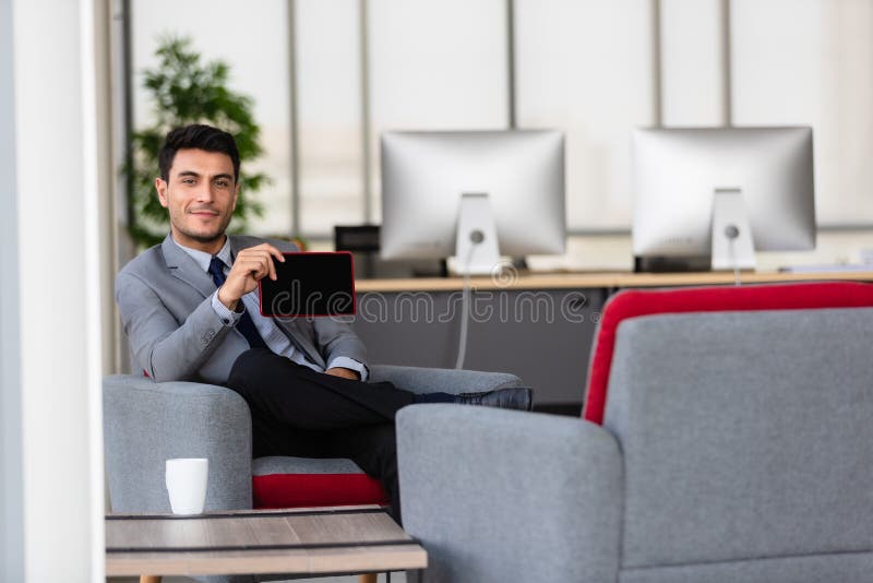 Businessman Uses Tablet Computer in Break Time Stock Image - Image of ...